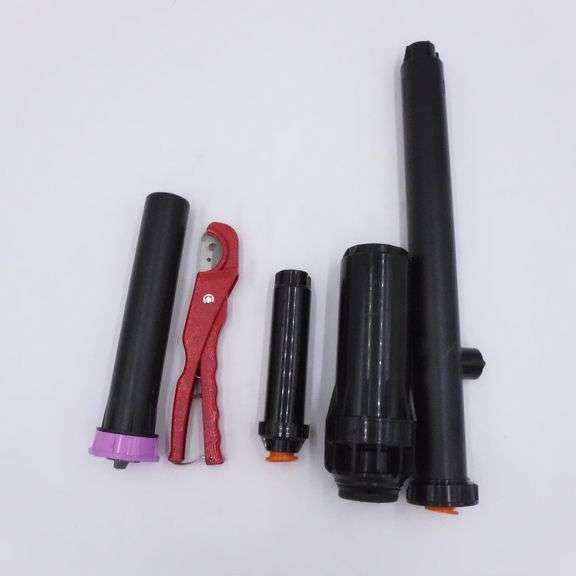 Assortment of: Sprinkler Heads Plus Tool: Tubing Cutter, Rain Bird Uni ...