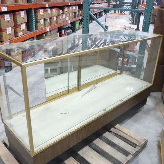 Used Glass Showroom Display Case with Sliding Doors in Back, Gold Frame ...