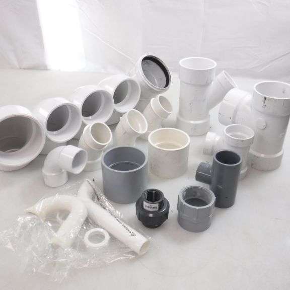 Assortment Of Different Sized PVC Pipe Connectors, Elbow Connectors ...