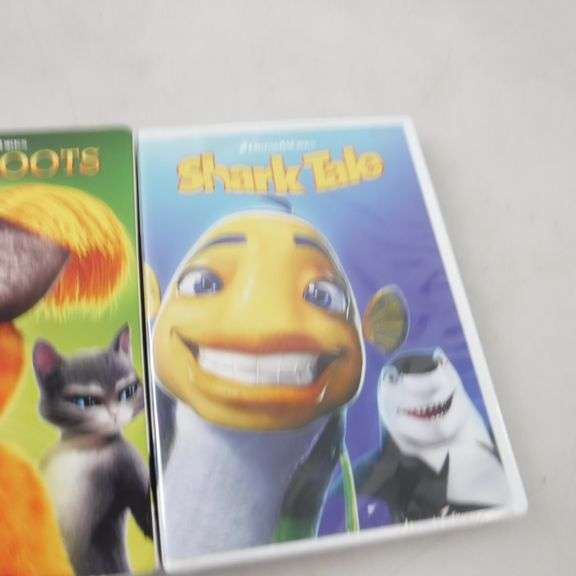 Assortment Of 3 Movies: Puss In Boots - PG / Shark Tale - PG / Monsters ...