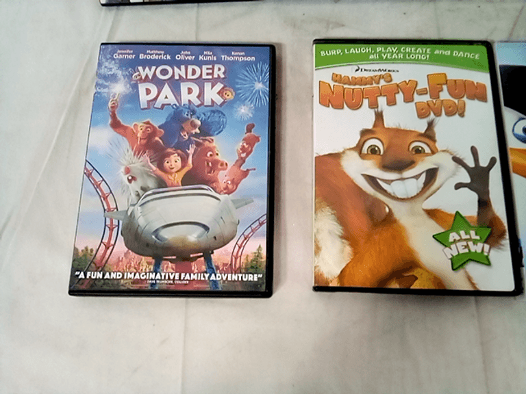 Assortment of 10 - Assortment Of Different Movie DVDs Including Toy ...